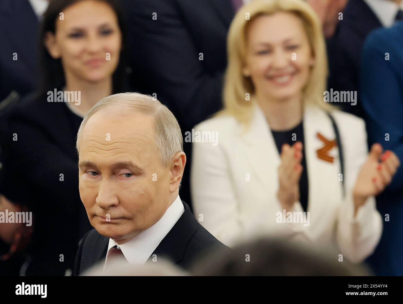 Vladimir Putin walks to take his oath as Russian president during an ...