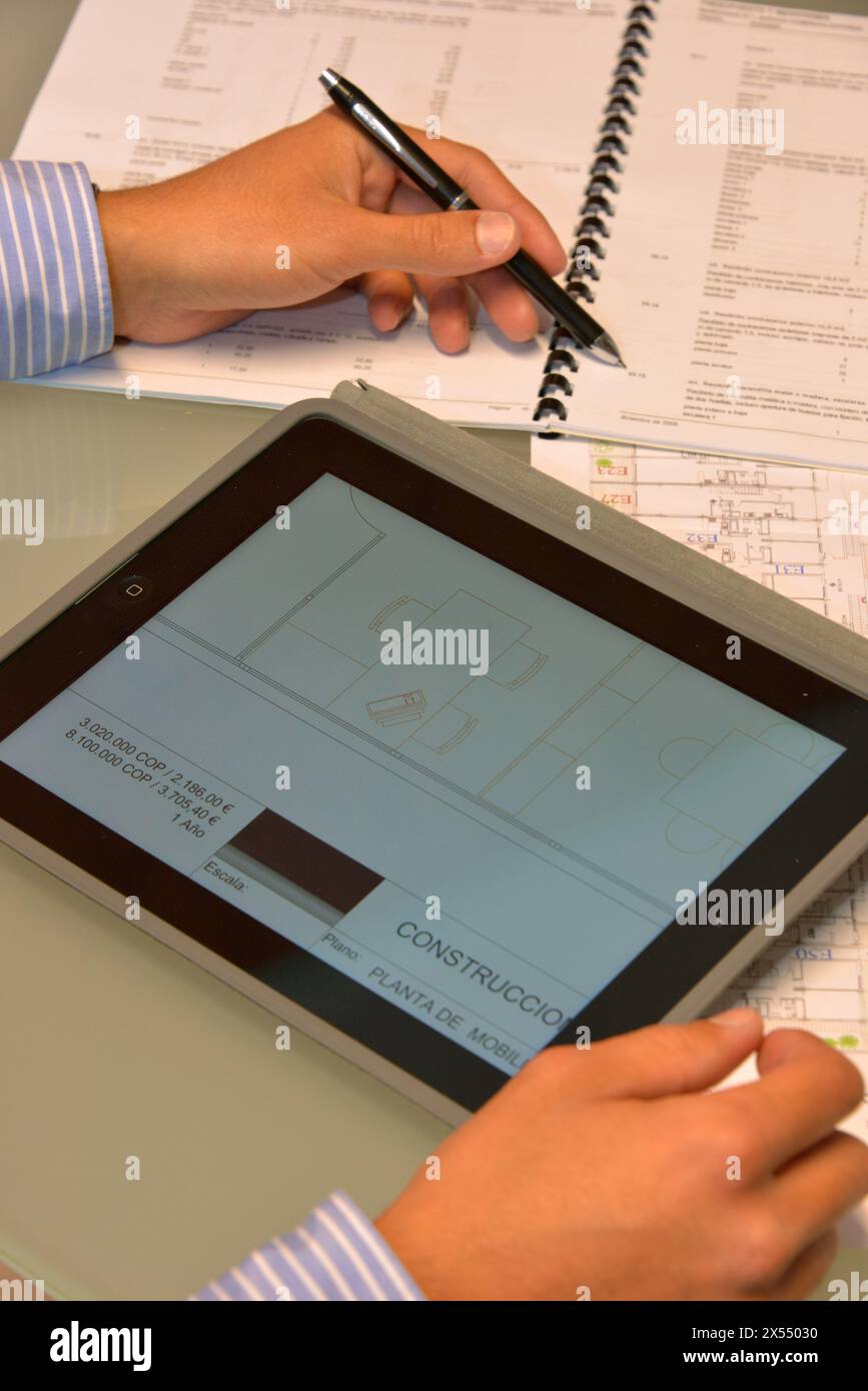 Working with a computer Stock Photo - Alamy