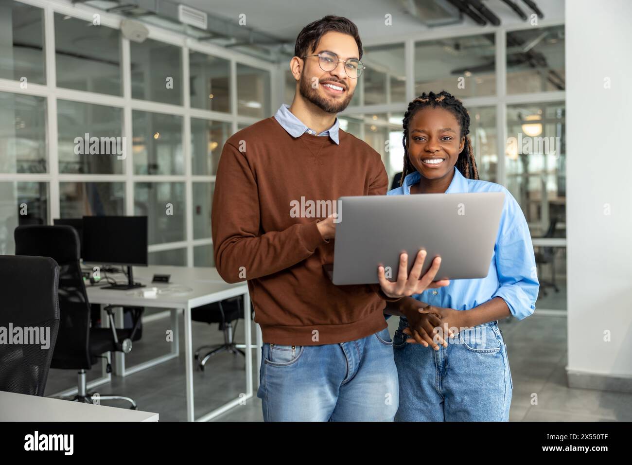 Diverse colleagues collaborating on hi-res stock photography and images ...