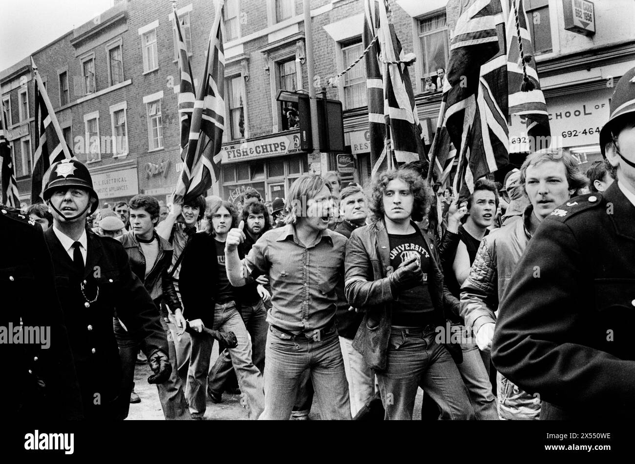 National Front members march carrying Union jack flags from New Cross ...
