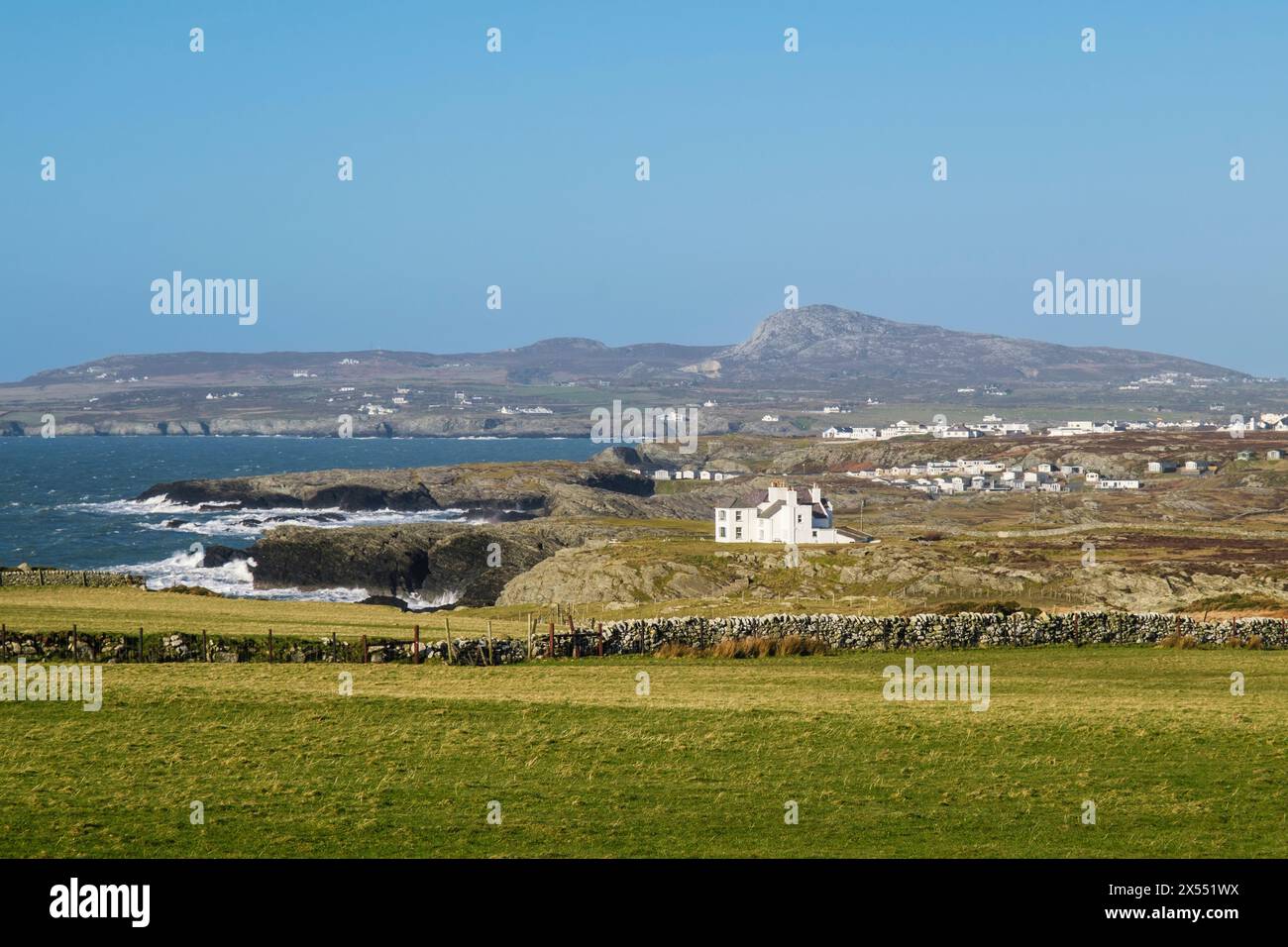 View across countryside on the coast towards Trearddur and Holyhead mountain from Rhoscolyn ...