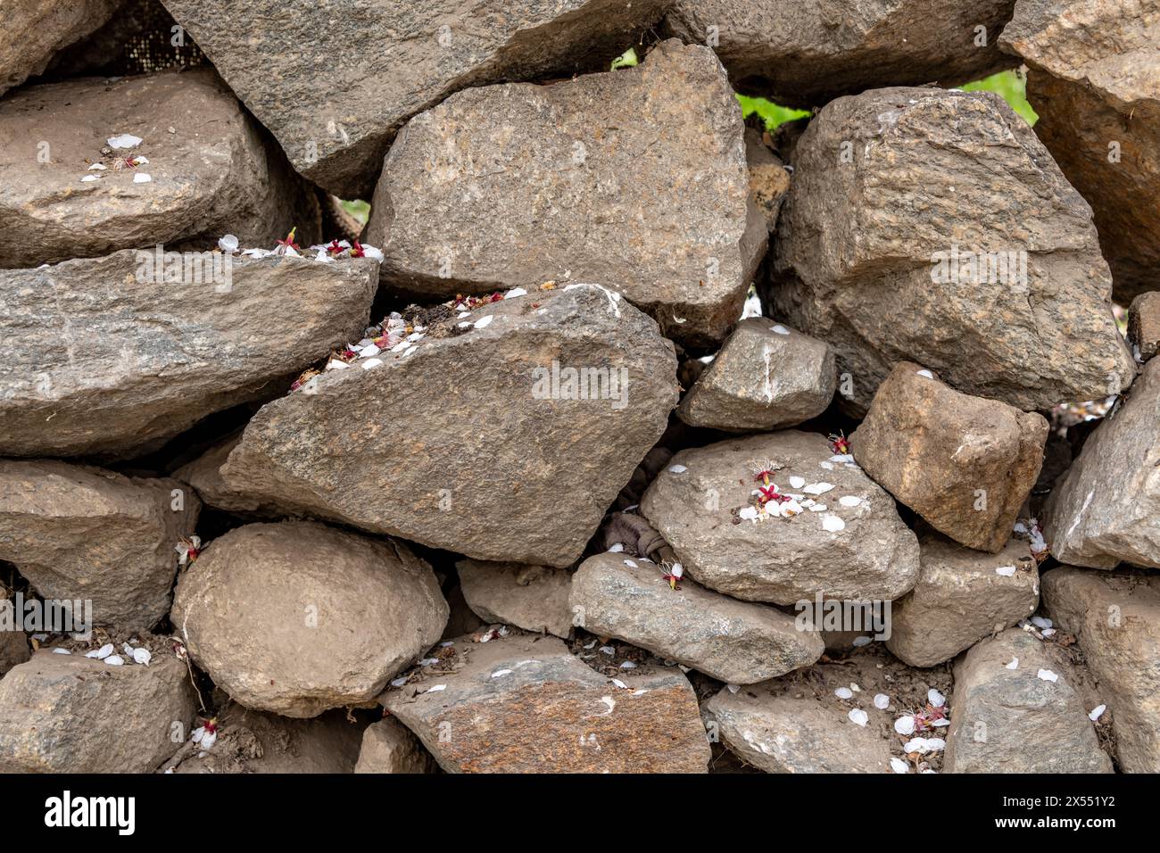 Different sizes and shapes of field stones in a rock wall in Turtok ...