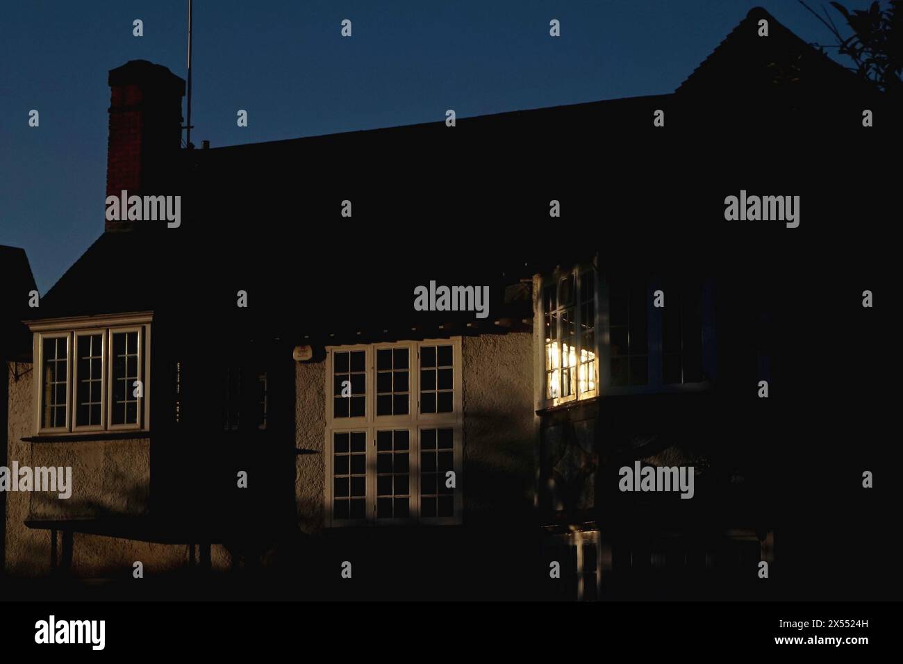 An editorial image that shows light reflecting off a lone window on a ...