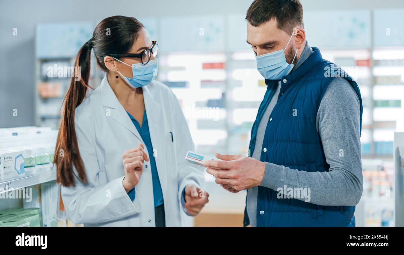 Pills helping pharmacist man hi-res stock photography and images - Alamy
