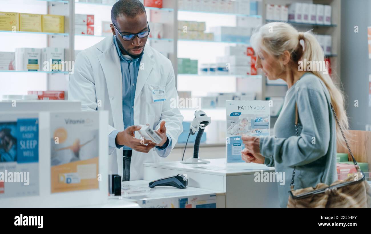 Pharmacy Drugstore Checkout Counter: Black Male Pharmacist Explains Use ...
