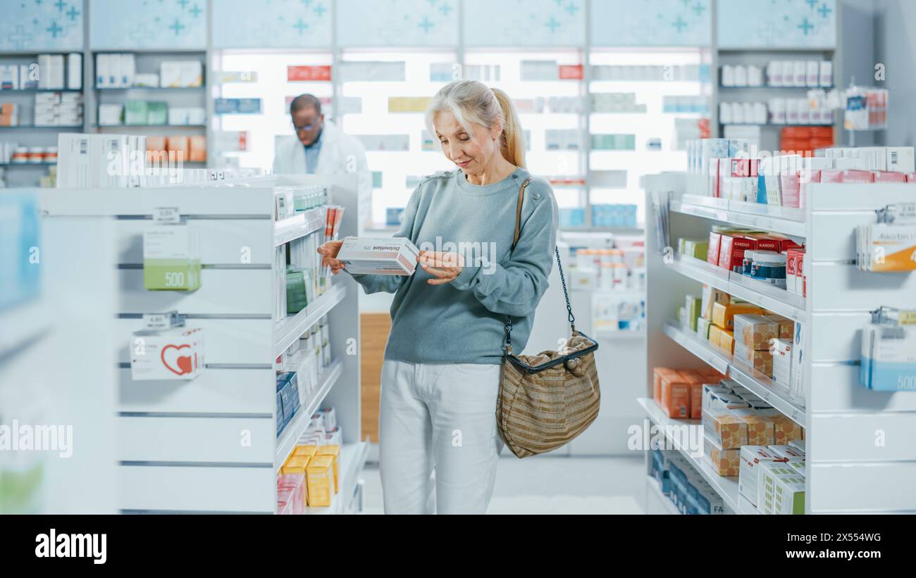 Elderly client choosing vitamins hi-res stock photography and images ...