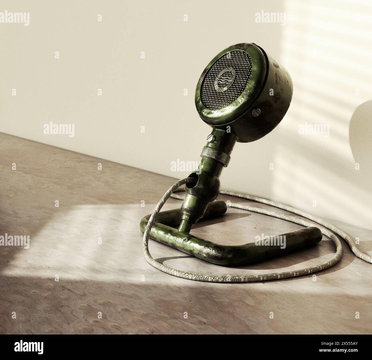 A vintage antique desk microphone on an isolated surface and wall ...