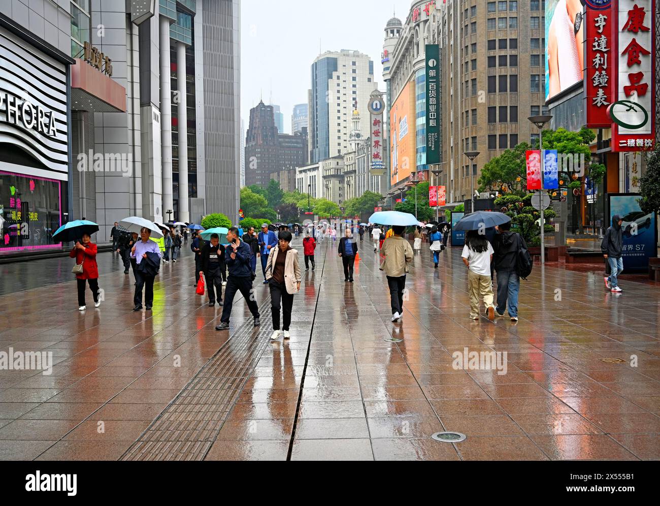 Shanghai, China - May 05, 2024; Rainy Day in Nanjing Road, a Pedestrian ...