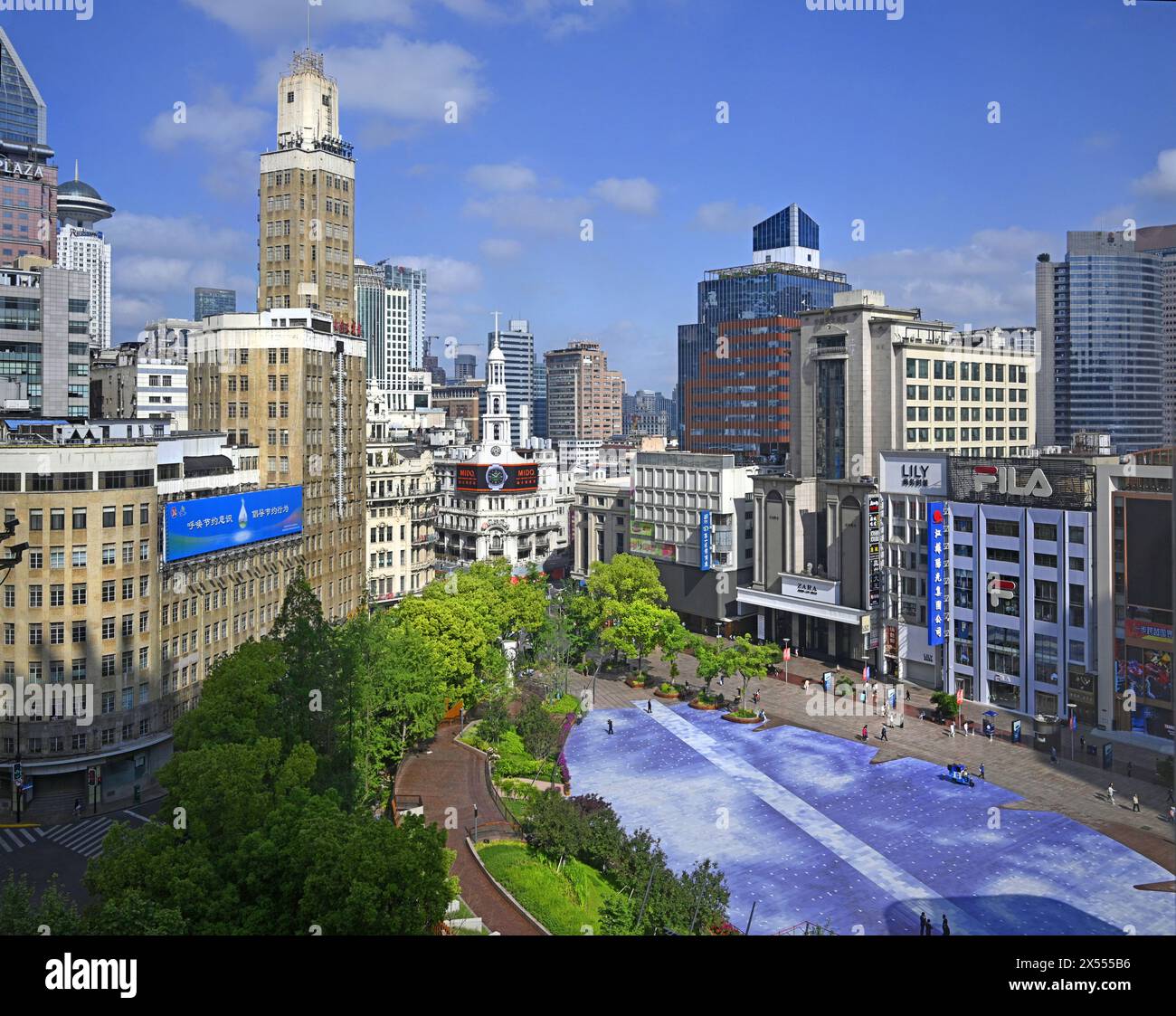 Shanghai, China - May 03, 2024; Nanjing Road skyline and Pedestrian ...