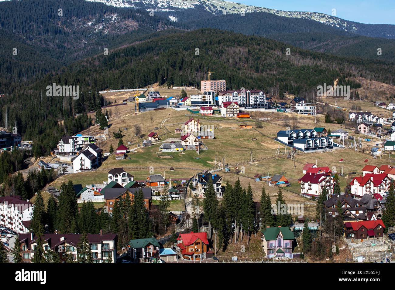 modern building complex in a mountainous area, a ski resort. Landscape ...