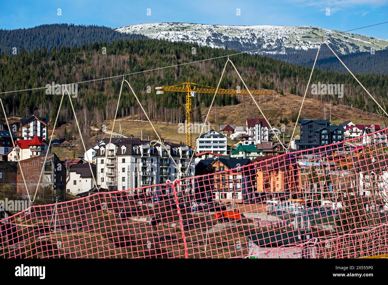 modern building complex in a mountainous area, a ski resort. Landscape ...