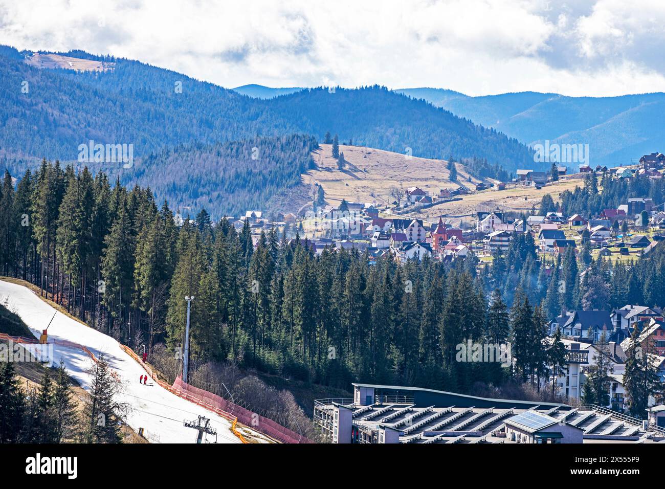 modern building complex in a mountainous area, a ski resort. Landscape ...