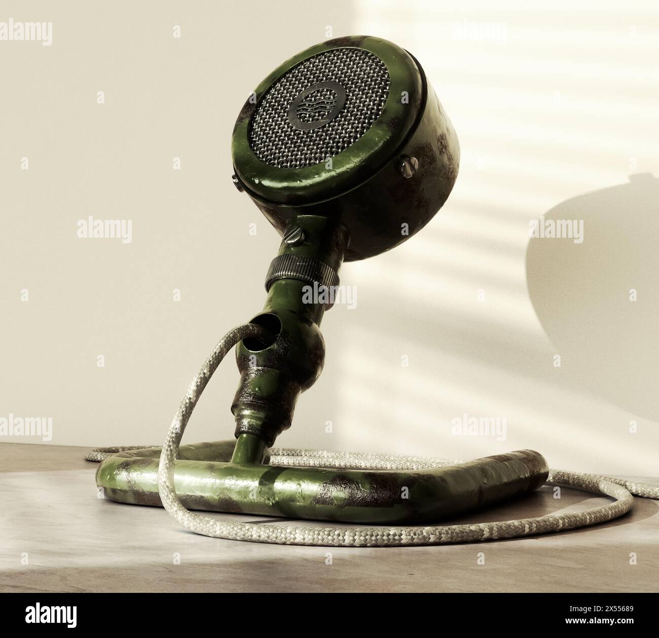 A vintage antique desk microphone on an isolated surface and wall ...