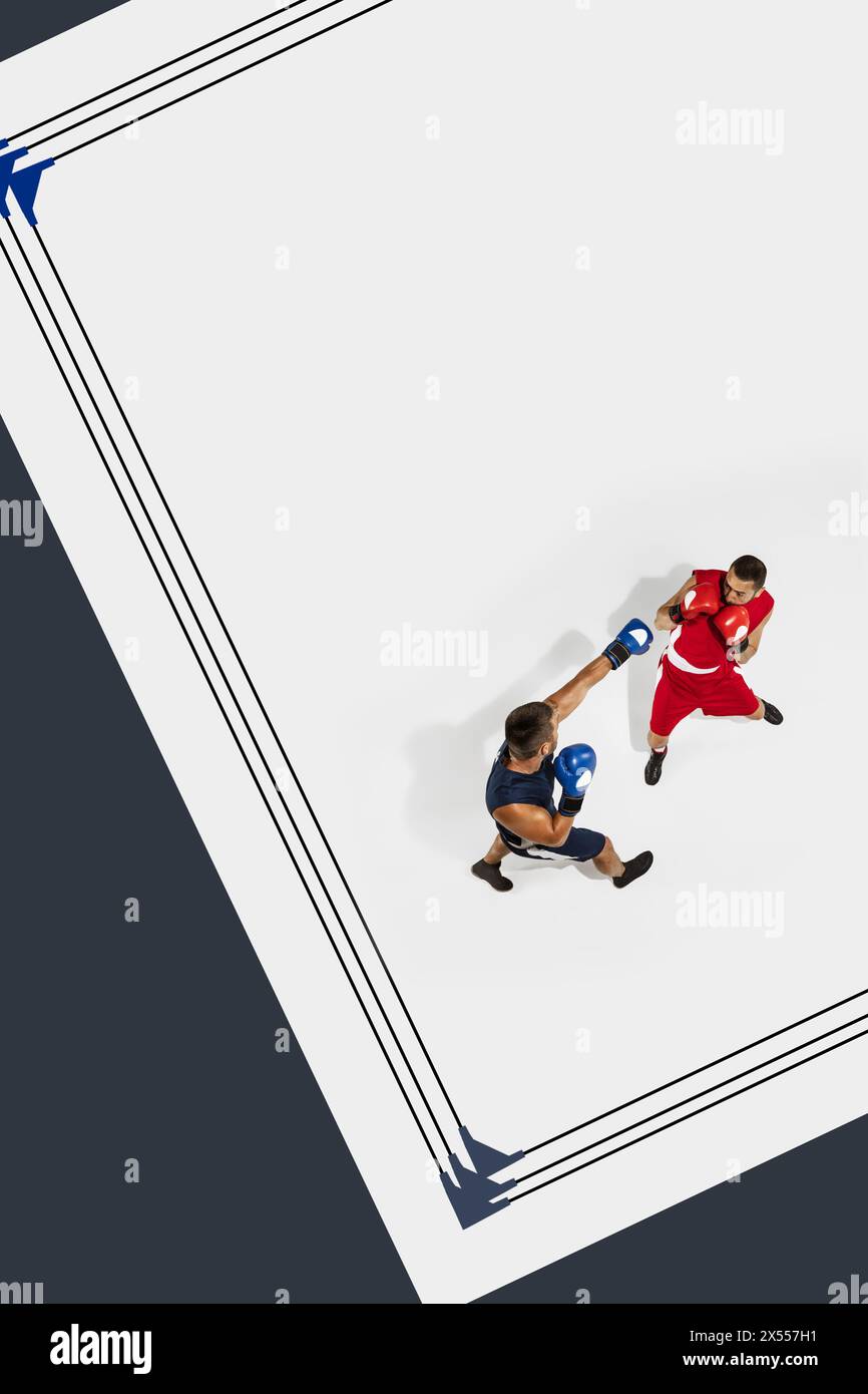 Aerial view on ring with two competitive men, boxers in motion ... Aerial view on ring with two competitive men, boxers in motion ...