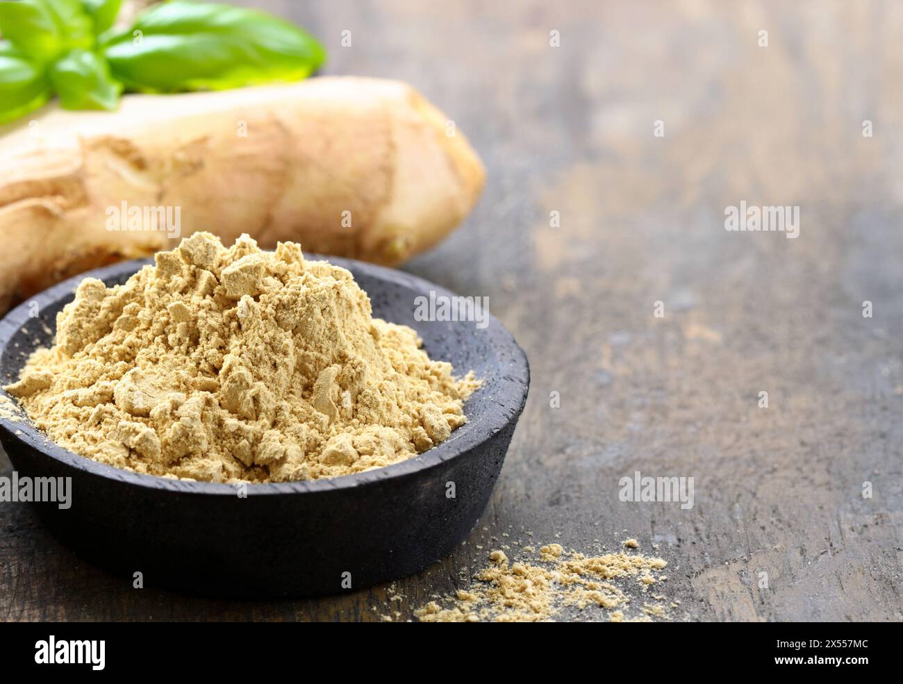 ground and fresh ginger spices for healthy eating Stock Photo - Alamy