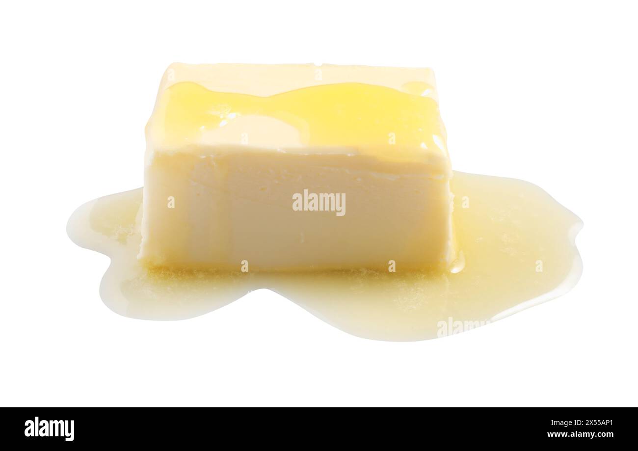 Piece of melting butter on white background Stock Photo - Alamy