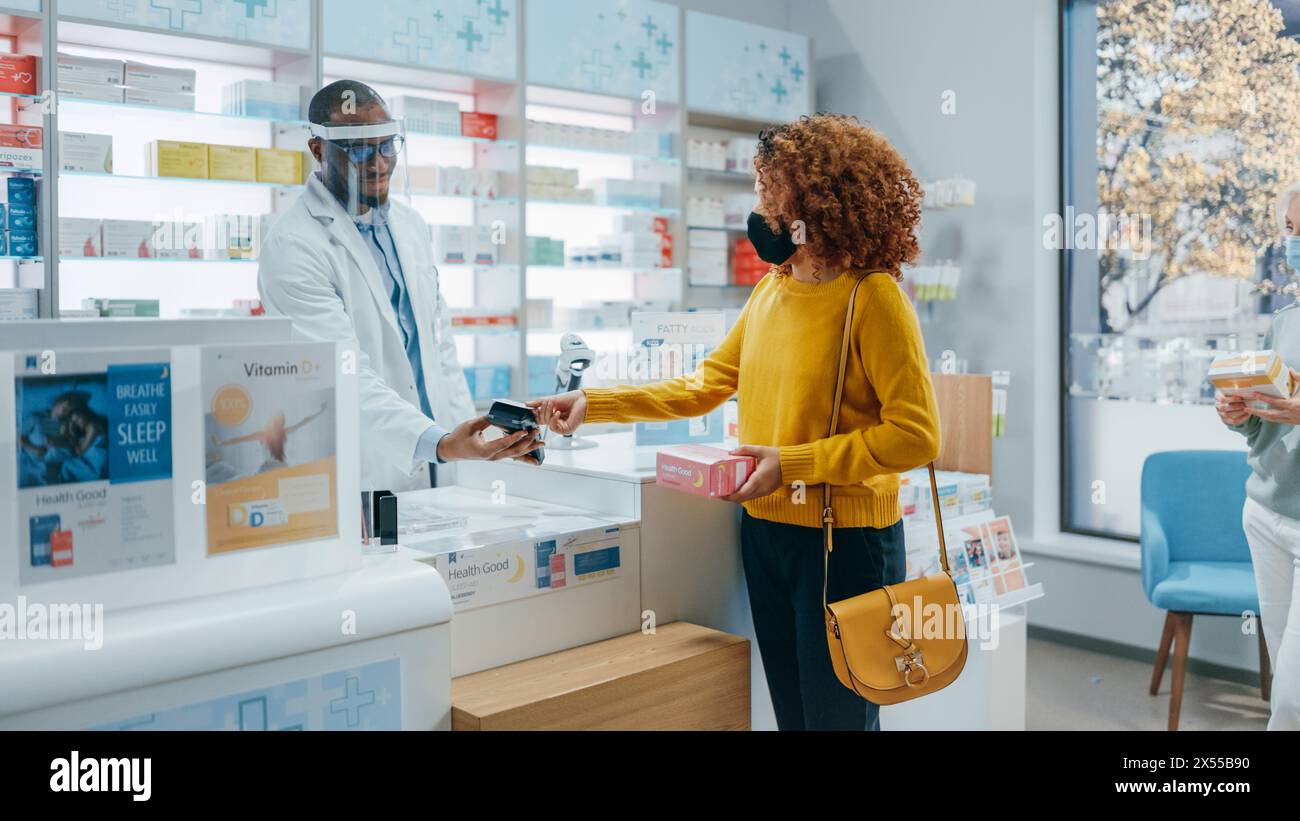 Pharmacy Drugstore Checkout Counter: Professional Black Pharmacist ...