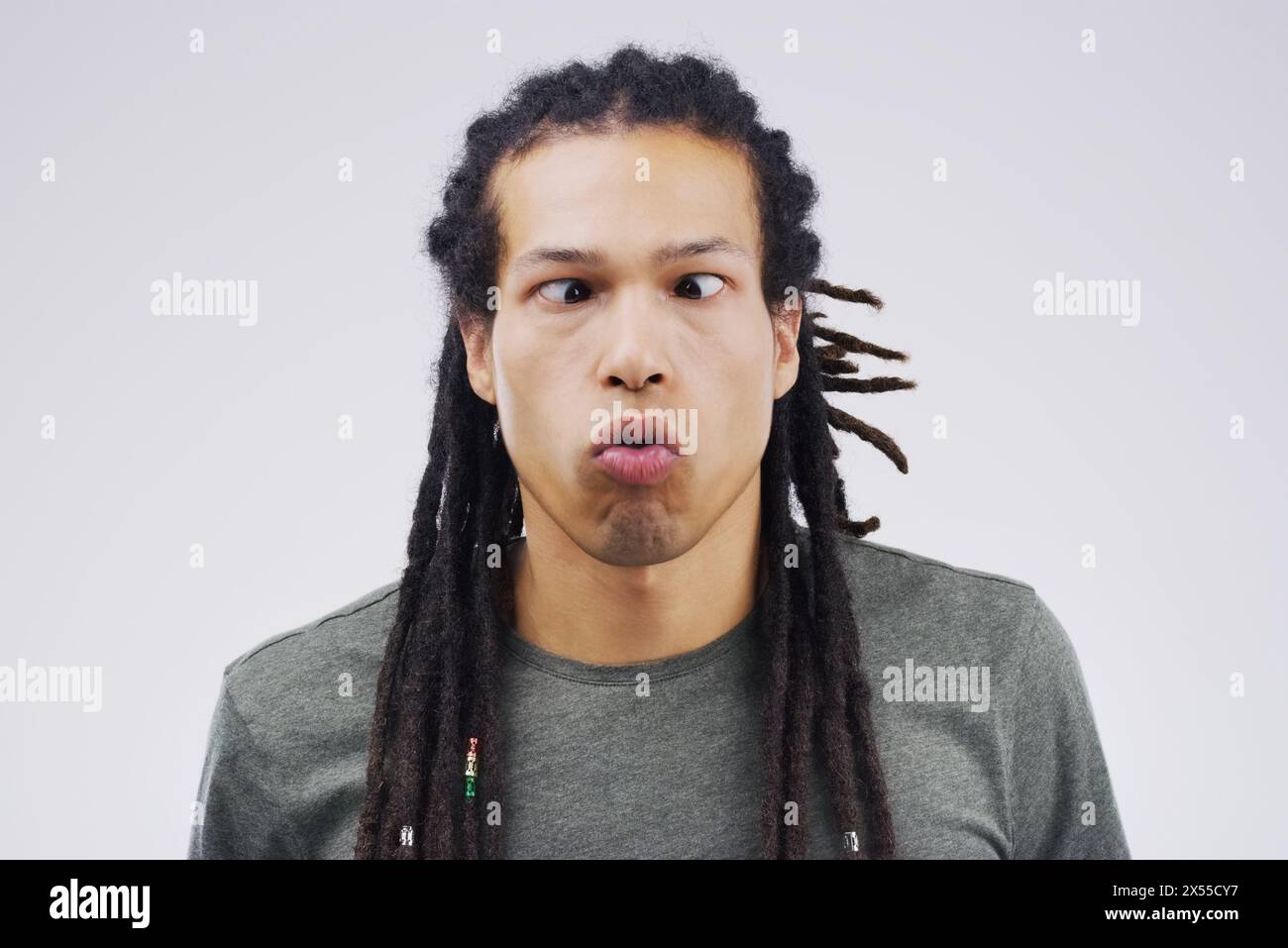 African man, funny face and fish lips in studio for comic, comedy and ...