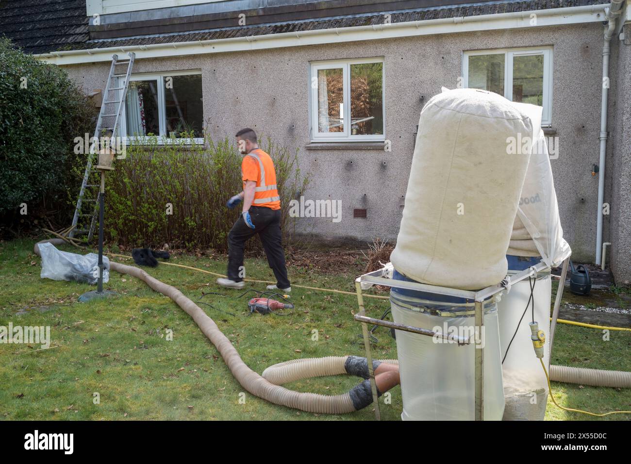 Extracting old cavity wall insulation that has failed prior to ...