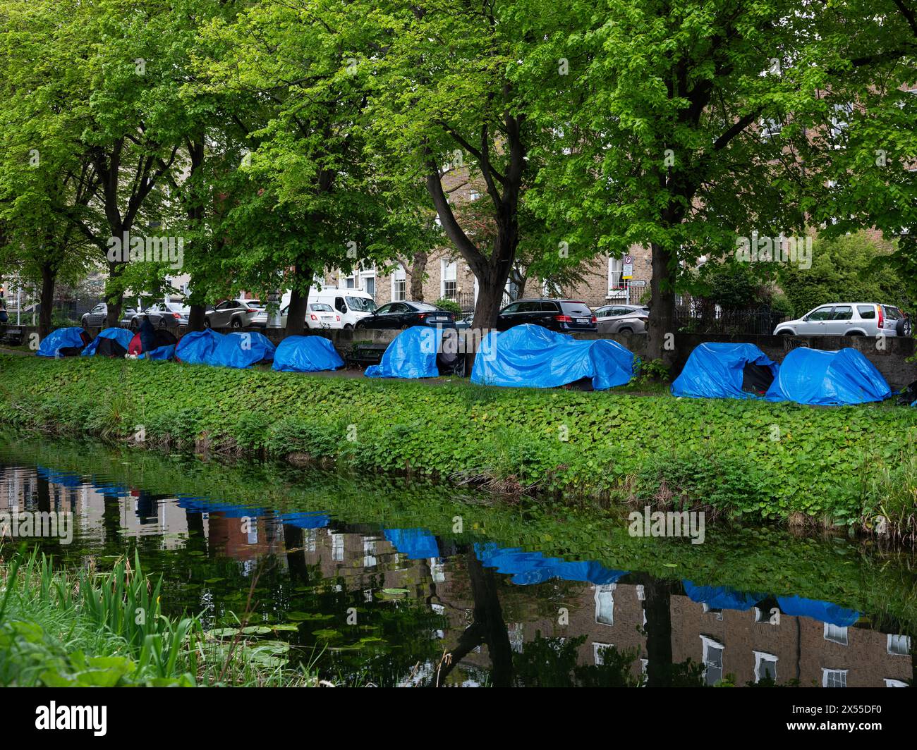 A makeshift camp of asylum seeker tents on the Grand Canal in Dublin ...