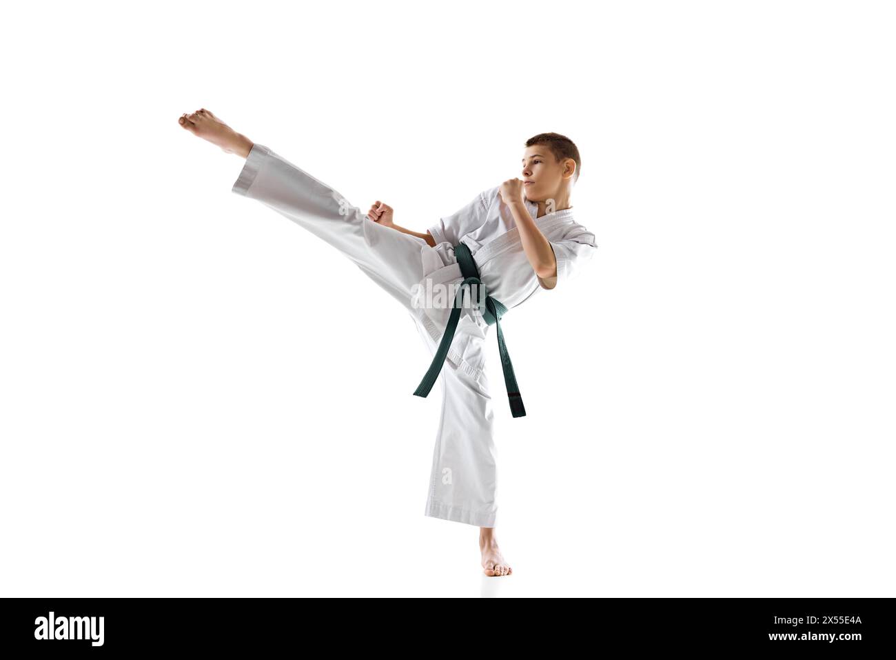 Teen boy, athlete practices karate moves, demonstrating skills and ...