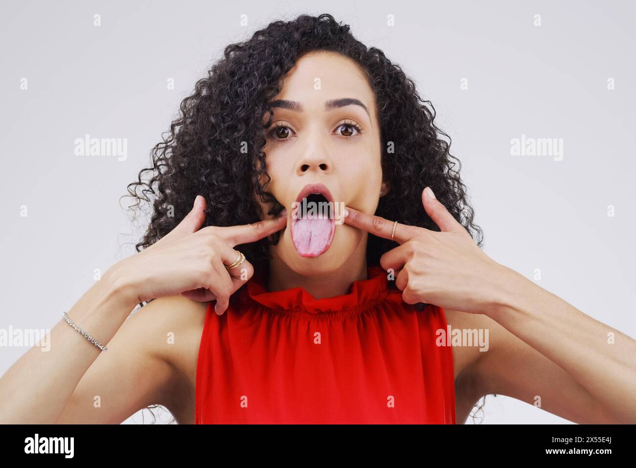 Woman, funny face or portrait in studio for comic, comedy and silly ...