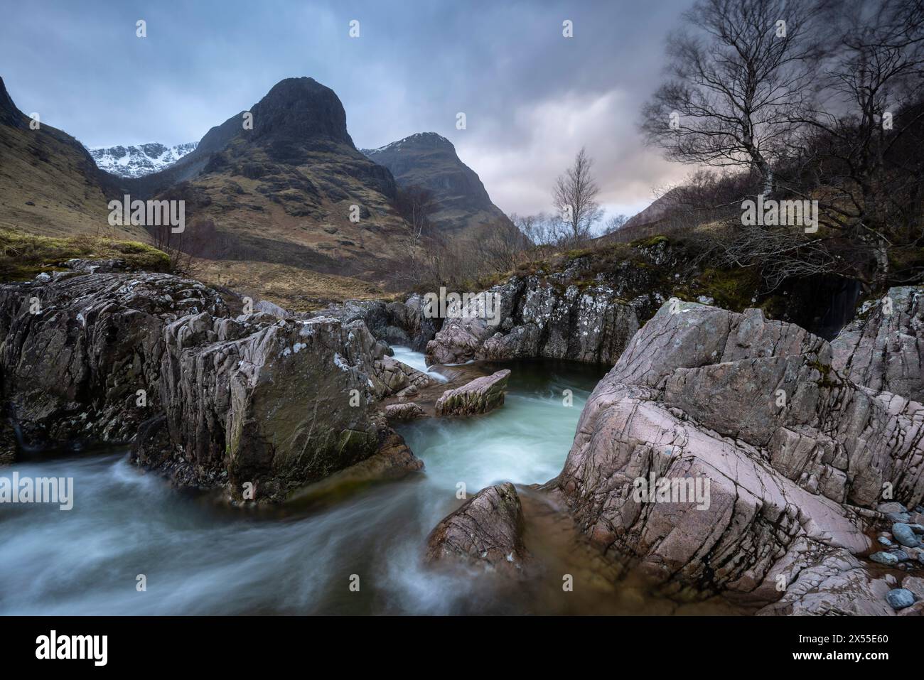 Fast flowing River Coe in Glencoe Valley in the Scottish Highlands ...