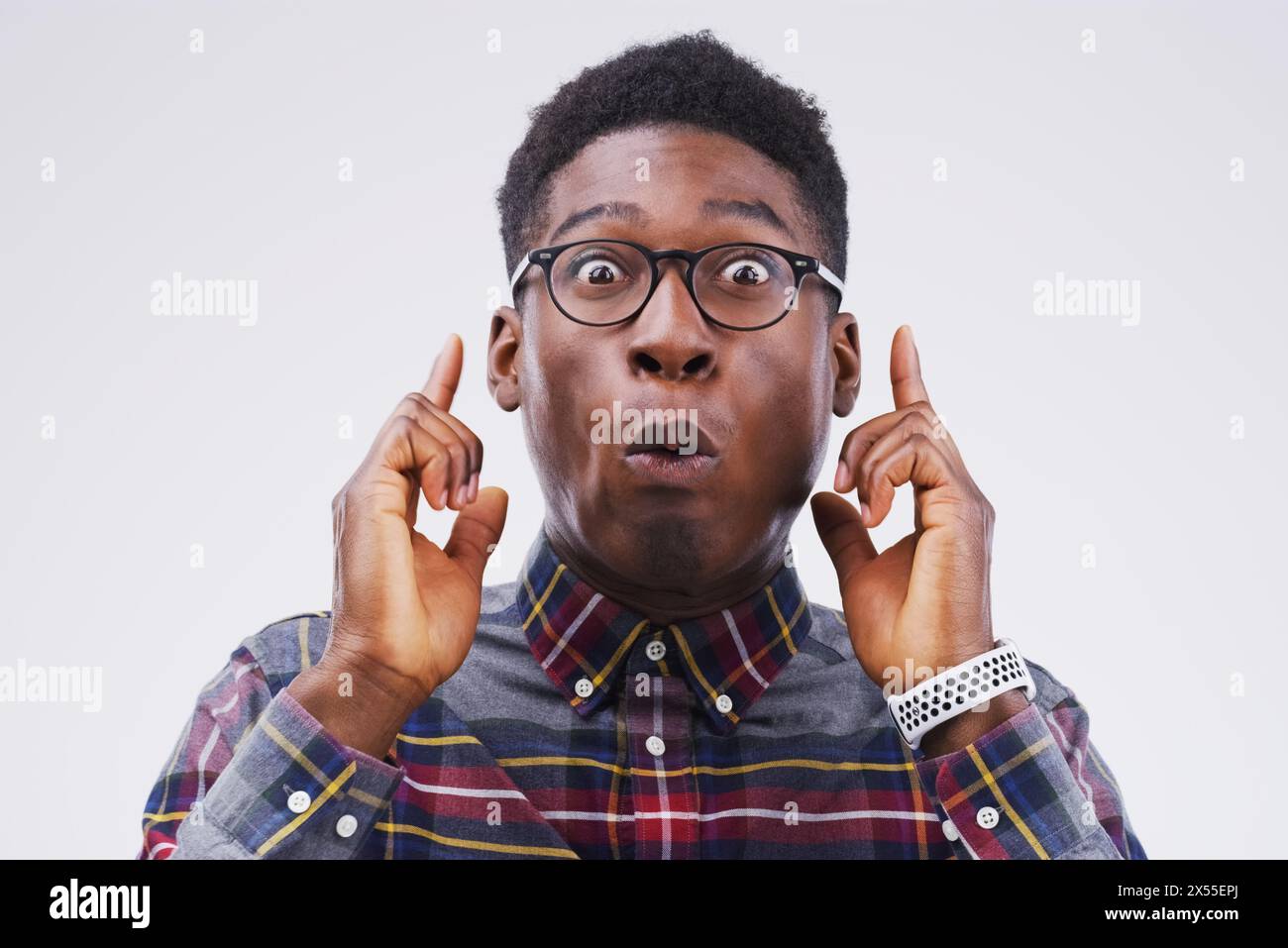 Black man, funny face and portrait with glasses in studio for playful ...