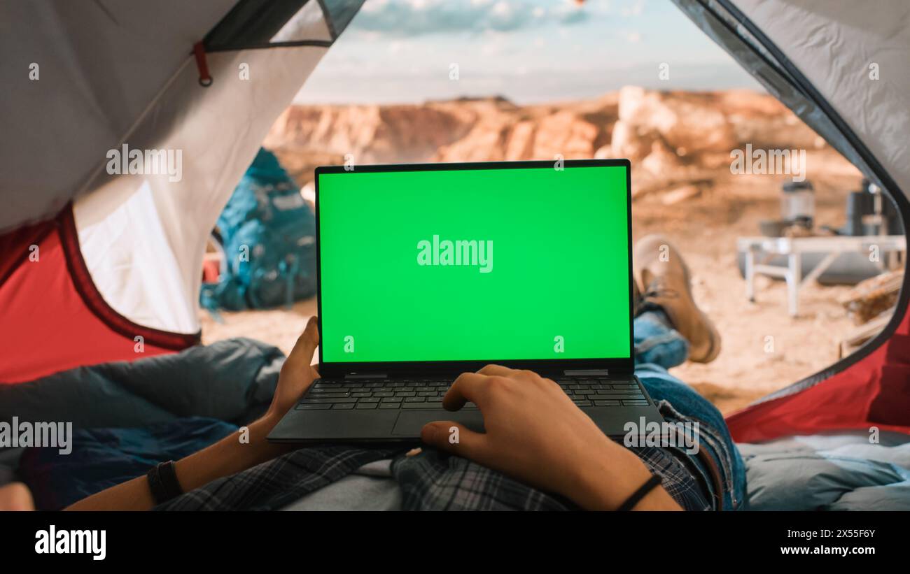 POV of a Tourist Using a Laptop Computer with Green Screen Placeholder ...