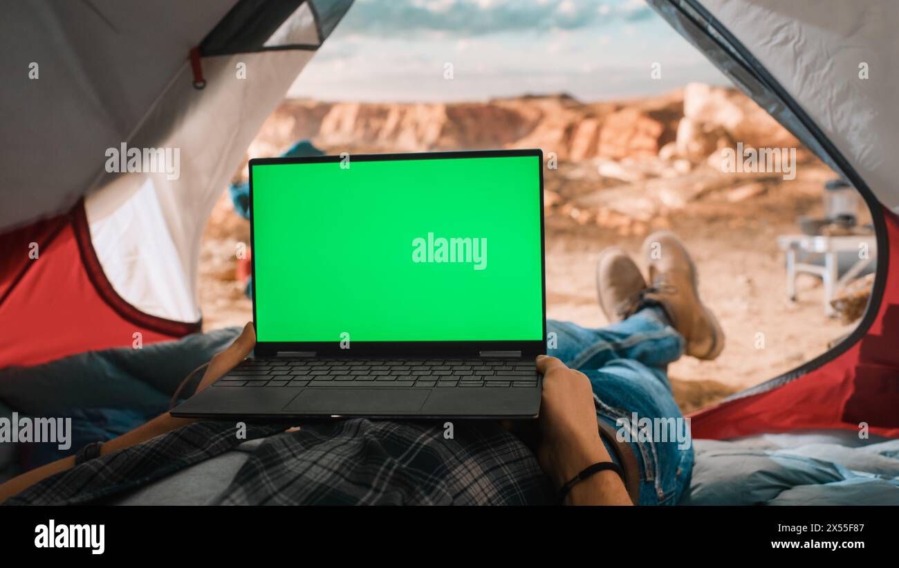 POV of a Tourist Using a Laptop Computer with Green Screen Placeholder ...