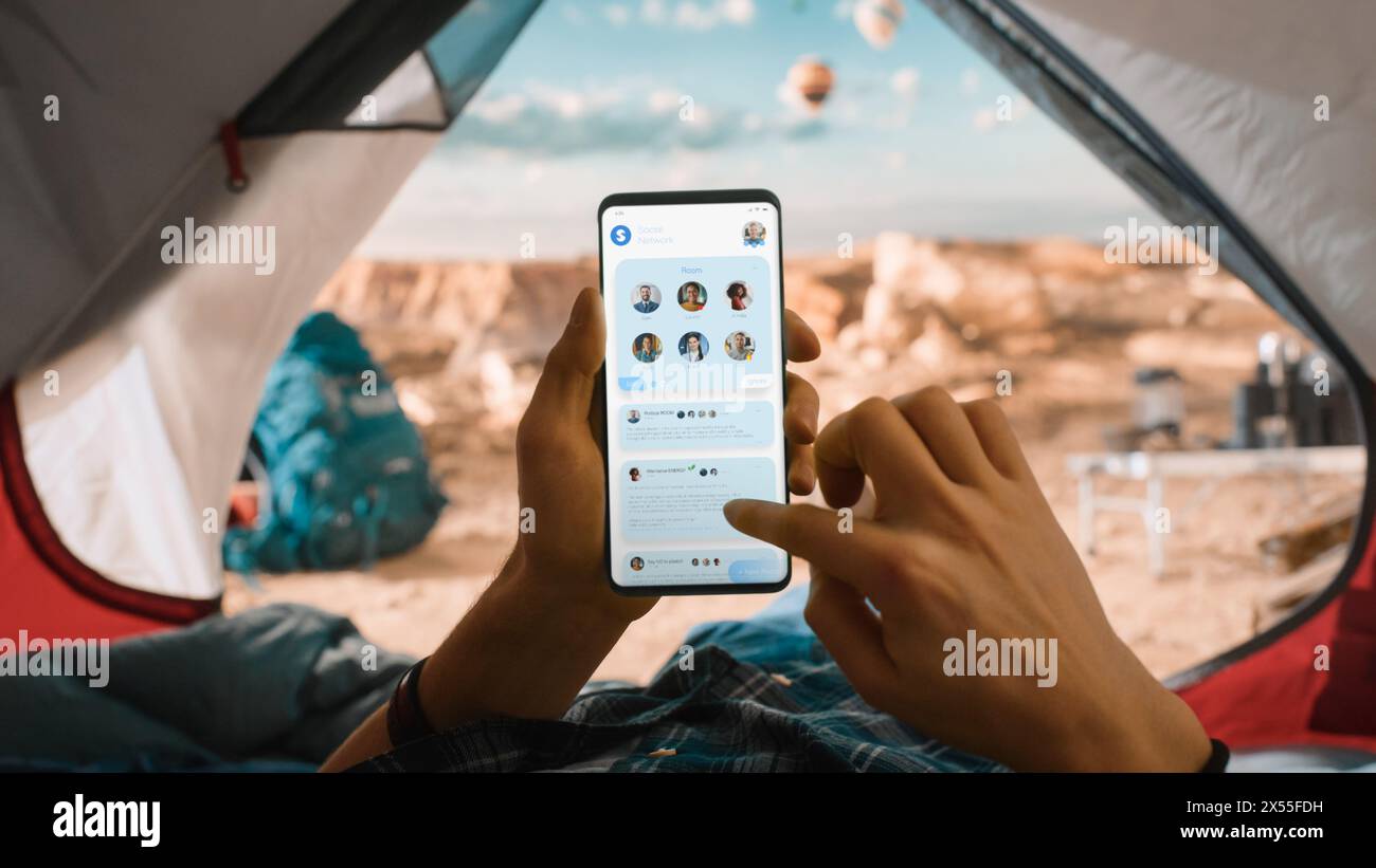 POV of a Tourist Vertically Holding a Smartphone and Checking Social Network Messages, Swiping a ...