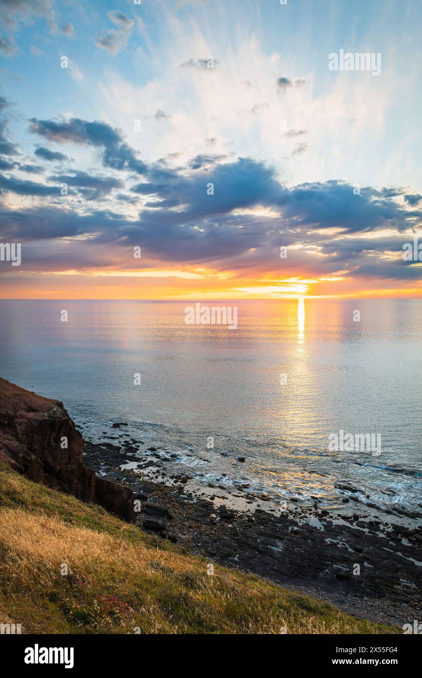 Dramatic sunset with fishing boat viewed from Hallett Cove Beach, South ...