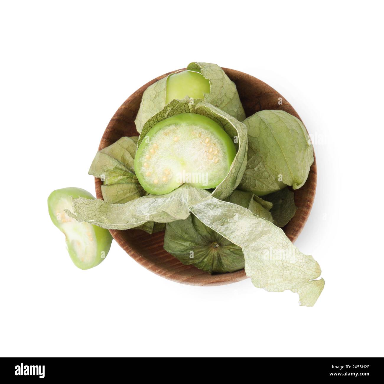 Fresh green tomatillos with husk in bowl isolated on white, top view ...