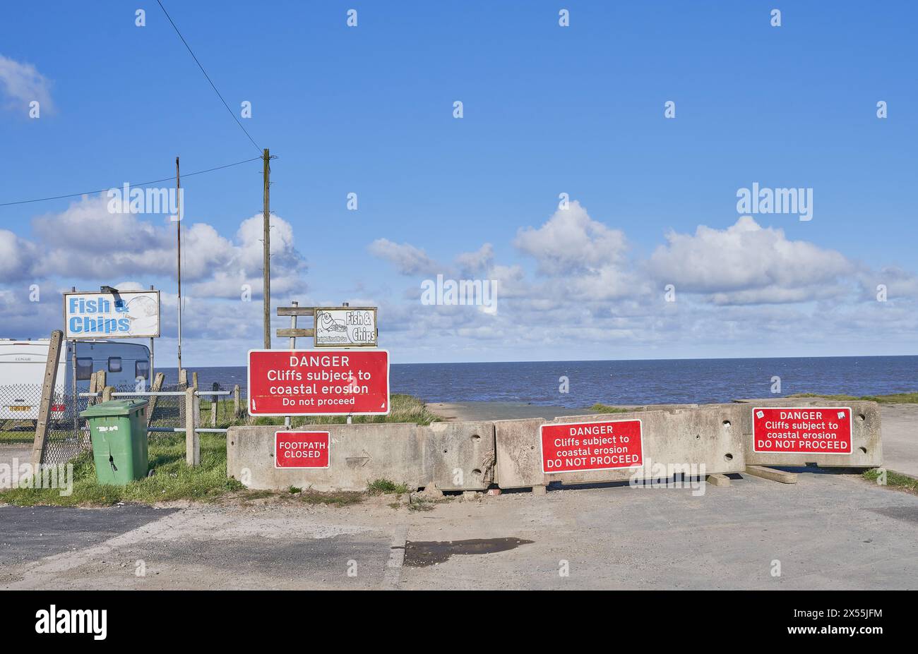 Coastal Erosion Signs on the cliff at Skipsea, Yorkshire Stock Photo ...