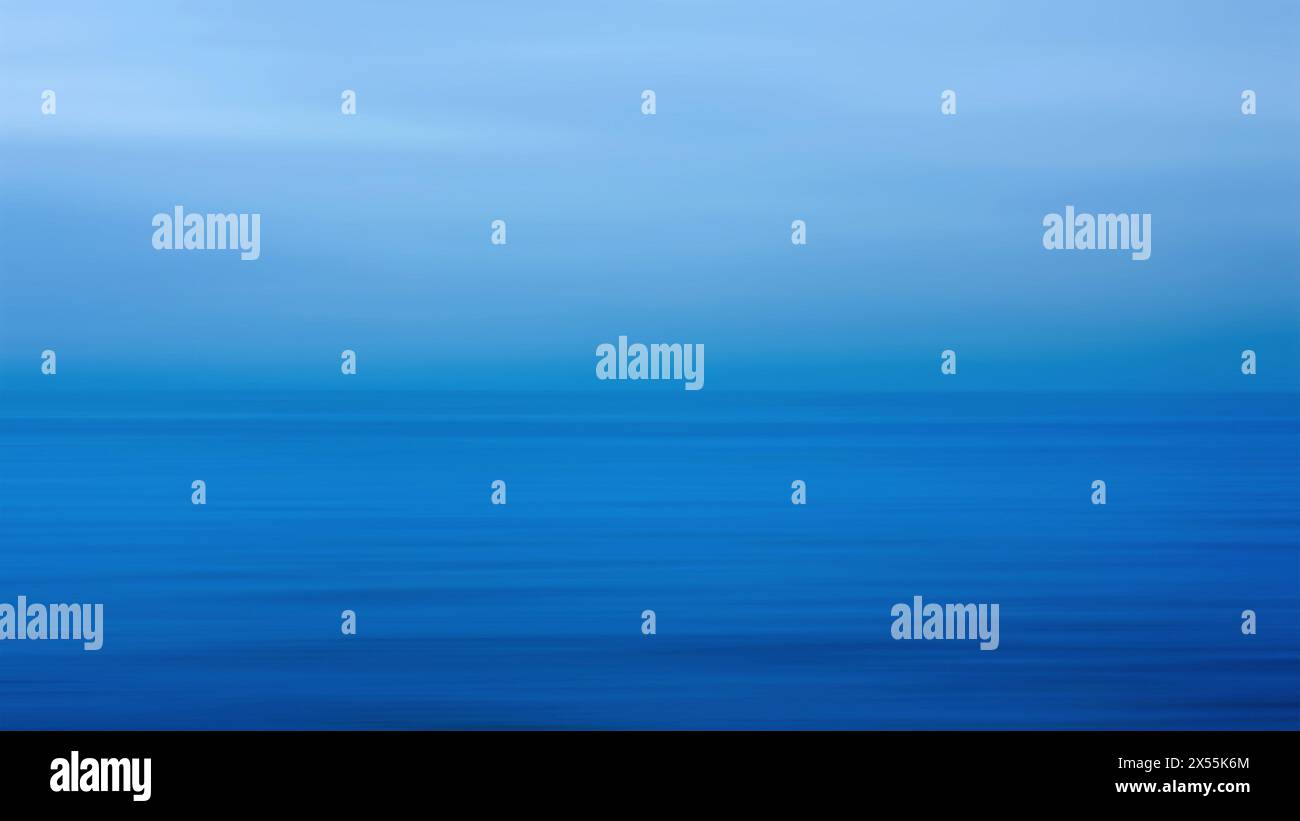 Blue sea meets blue sky Stock Photo - Alamy