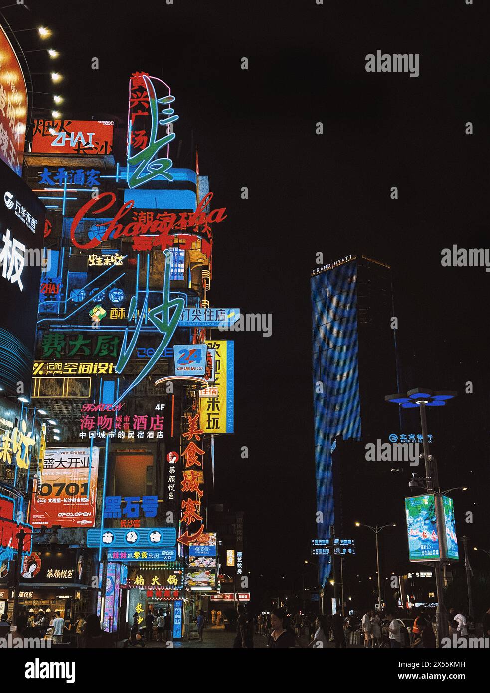 Bustling Nightlife Scene in Urban City With Neon Signboards and ...