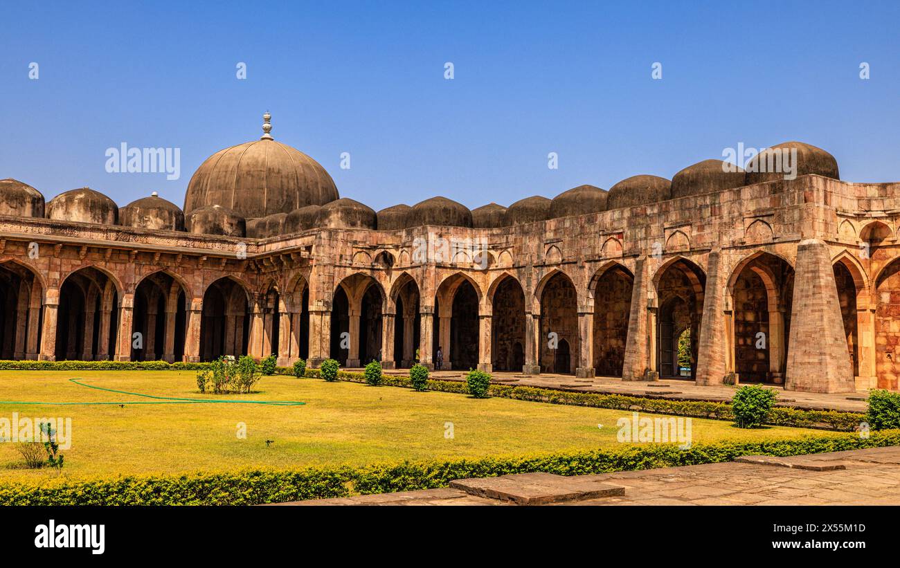 the many domed prayer hall of the jami masjid mosque facing a lawned ...