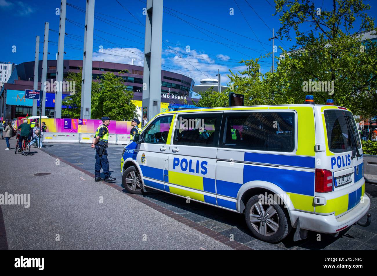 07 May 2024, Sweden, Malmö: Police officers secure the street in front ...