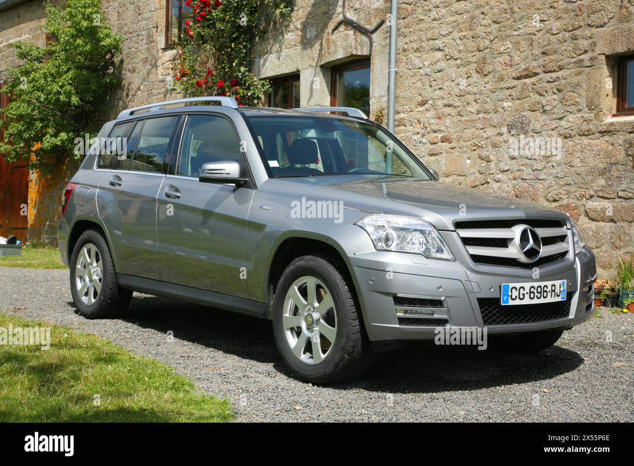 Mercedes Benz GLK SUV 4 wheel drive outside old farm house Stock Photo ...