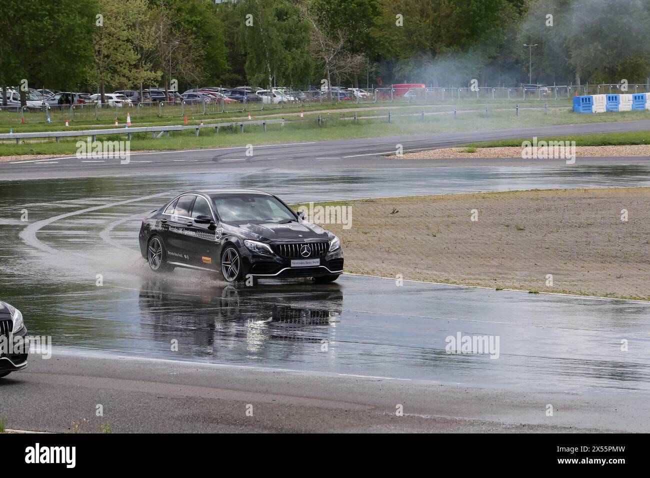 Mercedes-Benz C63 AMG driving on skid pan at Mercedes Benz World in ...