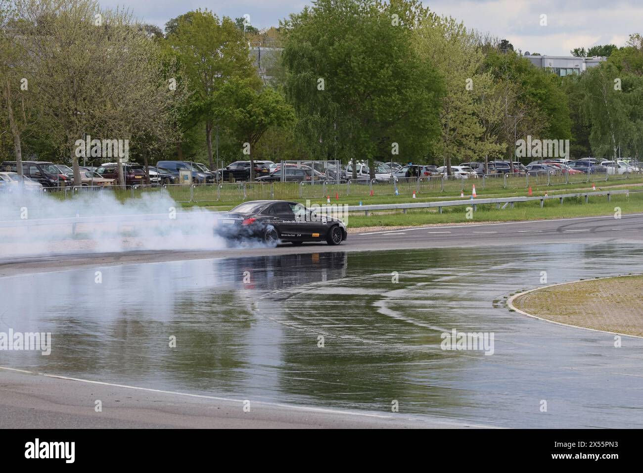 Mercedes-Benz C63 AMG driving on skid pan at Mercedes Benz World in ...