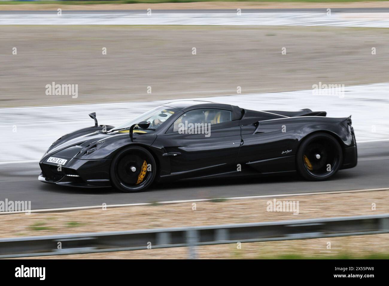 Pagani Huayra Roadster driving around track at Italian Car Day at ...