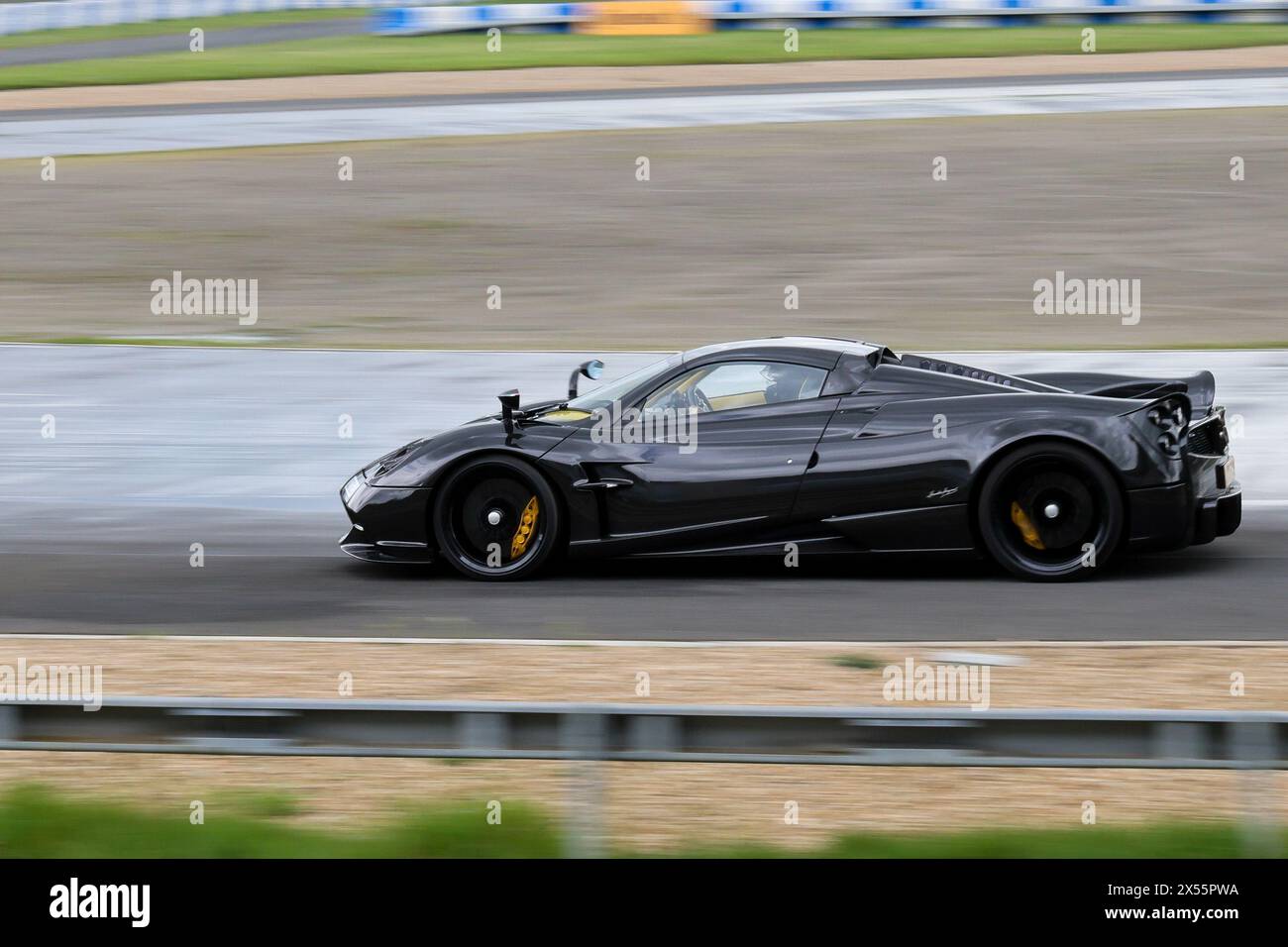 Pagani Huayra Roadster driving around track at Italian Car Day at ...