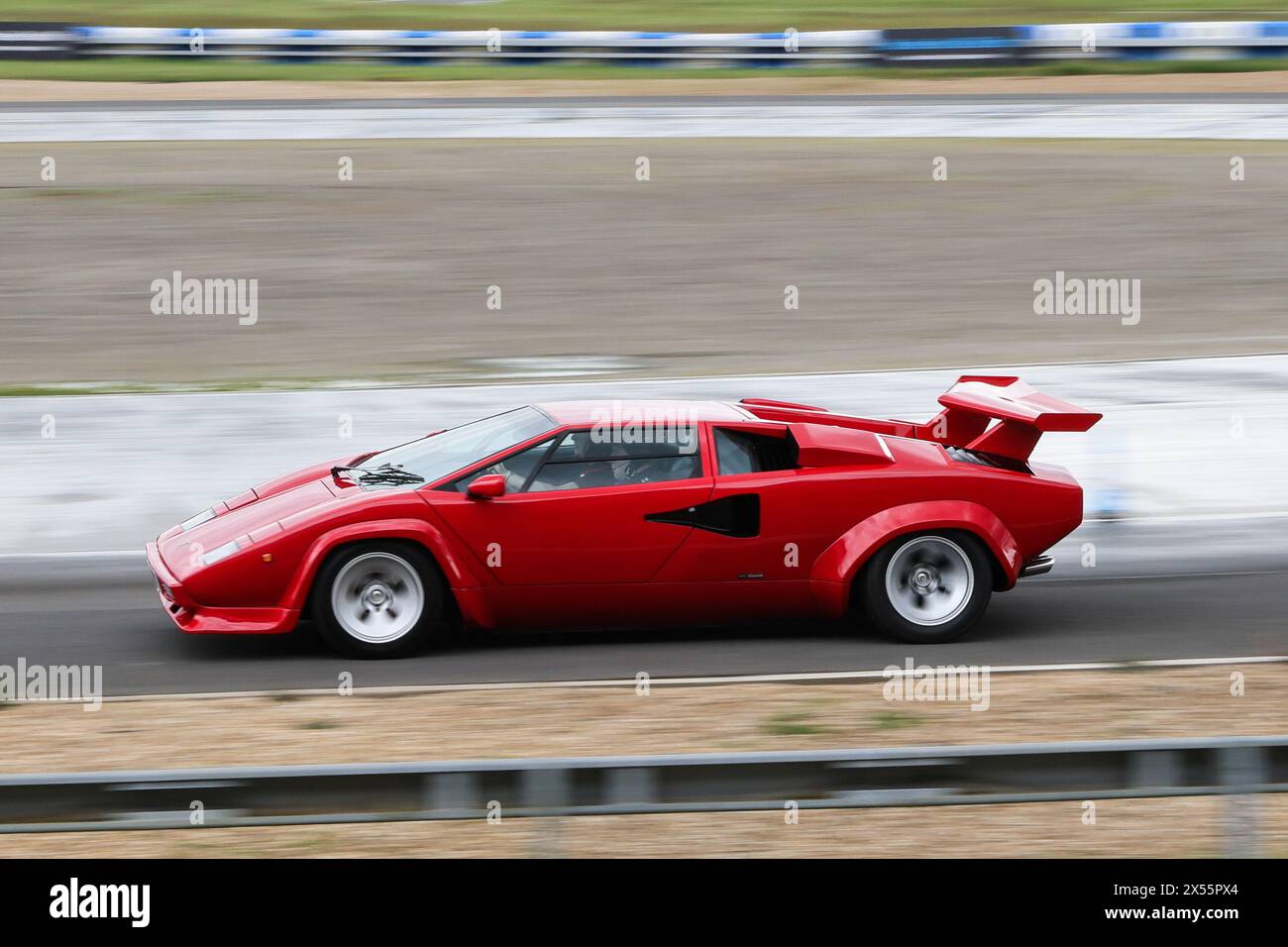 Lamborghini Countach driving around track at Italian Car Day at ...