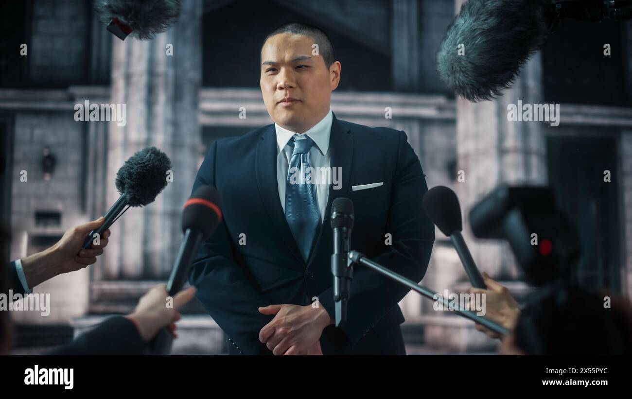 Charismatic businessman giving presentation hi-res stock photography ...