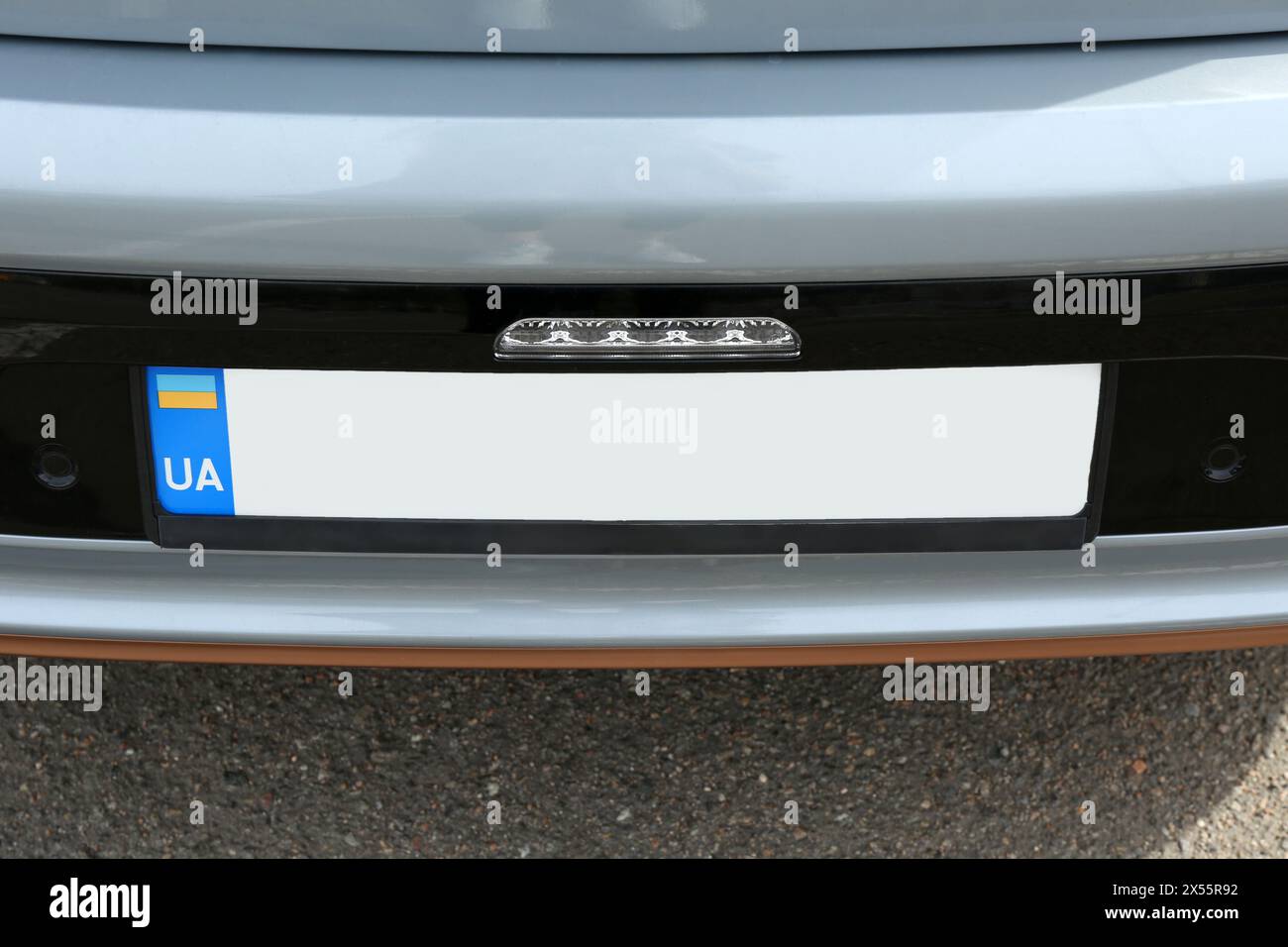 Car with vehicle registration plate outdoors, closeup Stock Photo - Alamy