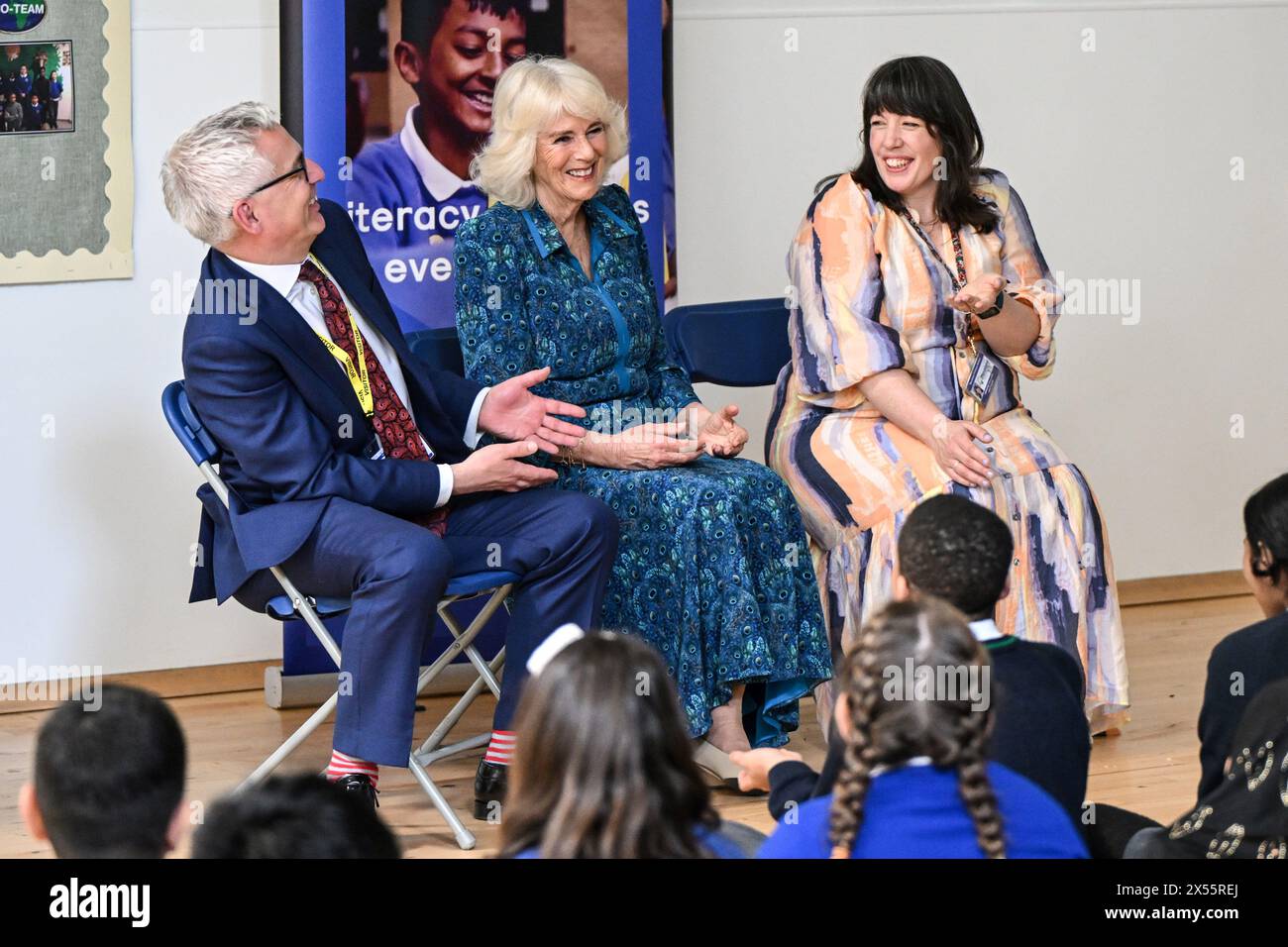 Queen Camilla joins Chief Executive, National Literacy Trust Jonathan ...