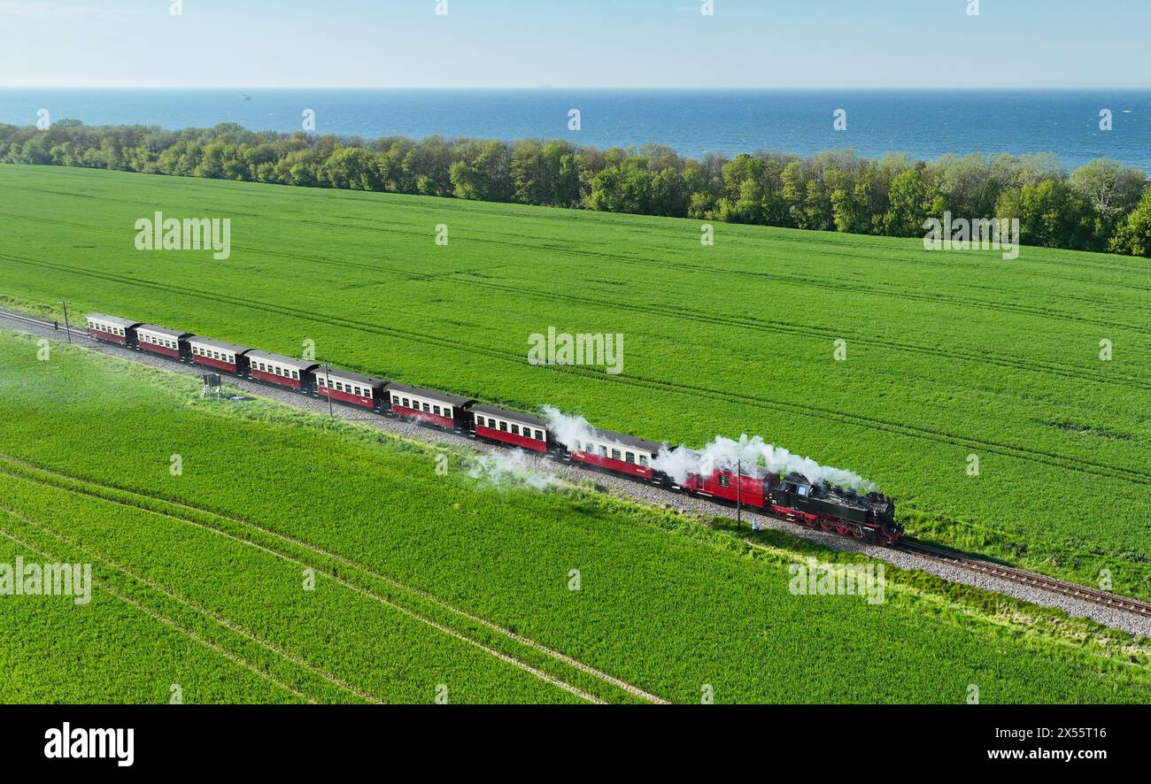 Aerial view of historical steam train Molli near Heiligendamm, Germany ...