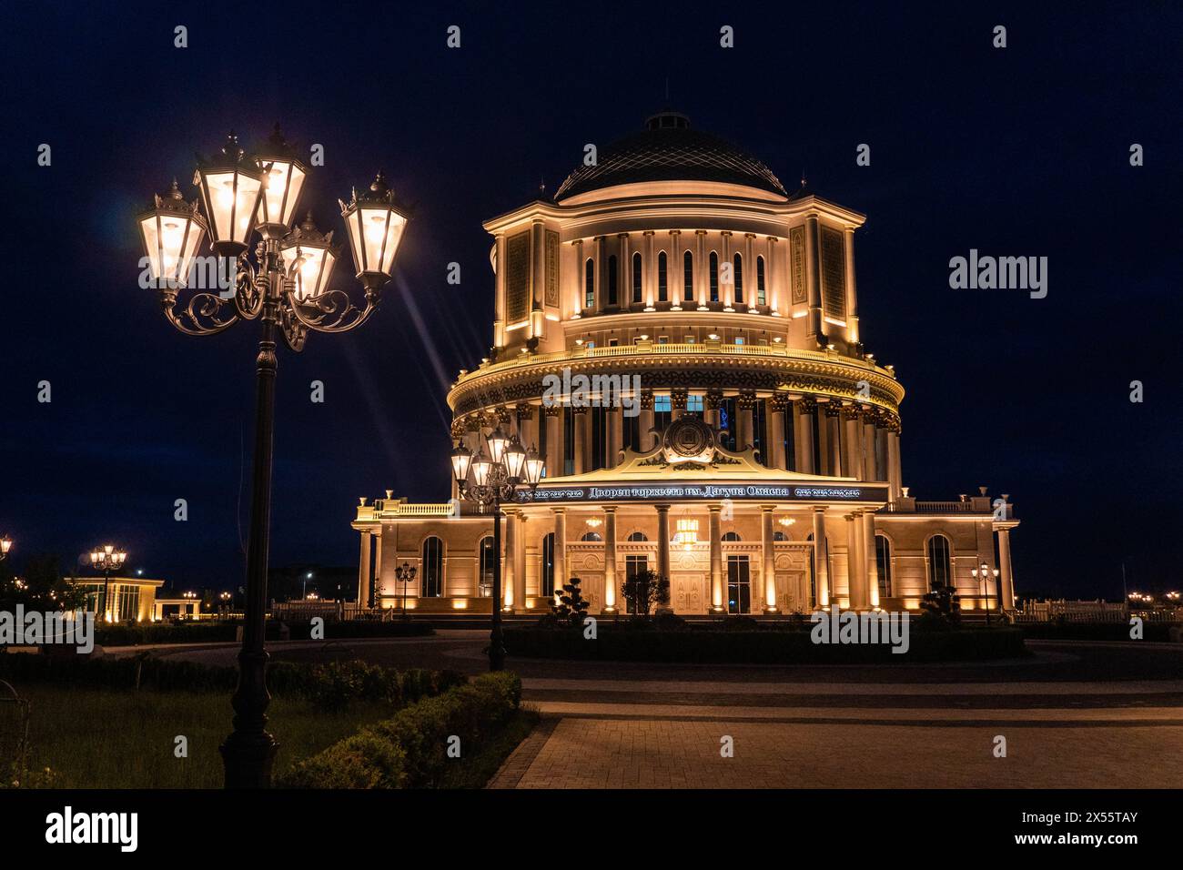 The night view on the "Celebration Palace" in the downtown of Grozny ...