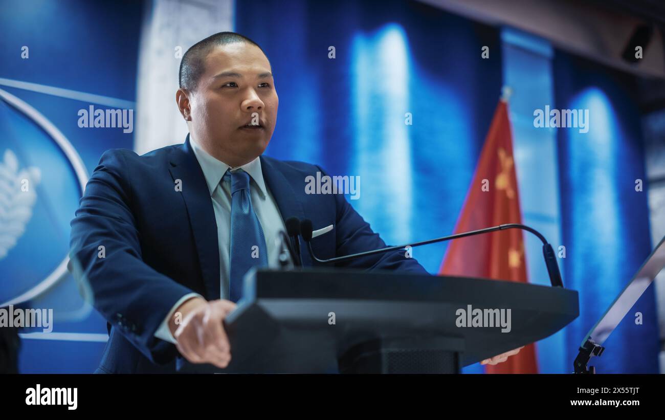 Portrait of Chinese Organization Representative Speaking at Press ...